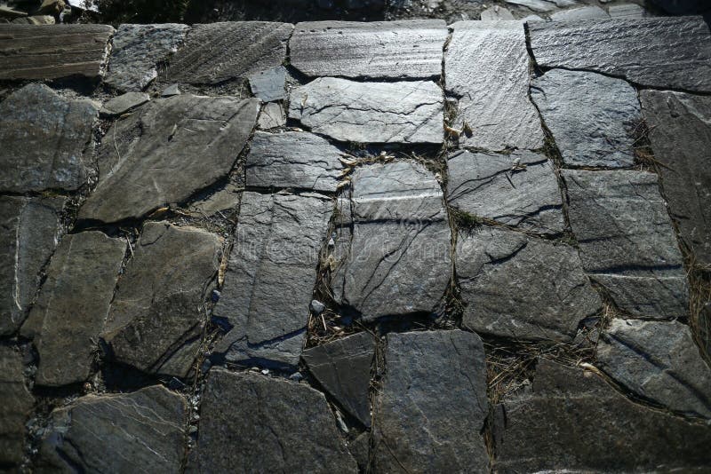 Piso de piedra irregular imagen de archivo. Imagen de mano - 65342445