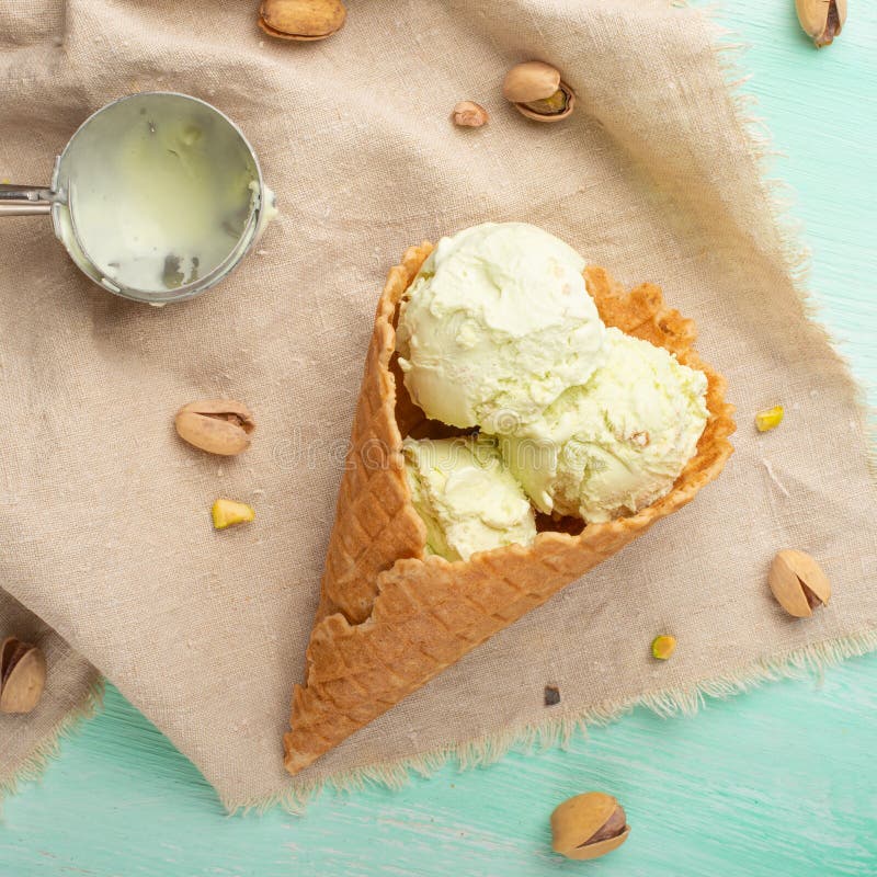 Pistachio Ice Cream with Pistachio Nuts and Ice Cream Spoon, Top View ...