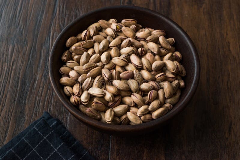 Pistachio Nuts with Shell in Wooden Bowl Stock Photo - Image of closeup ...