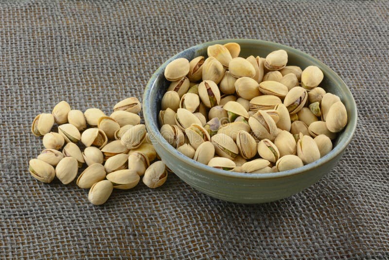 Raw Nuts in Shells in a White Serving Bowl Stock Image - Image of ...