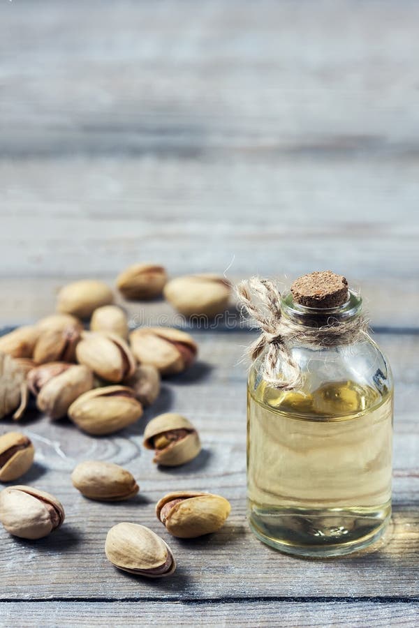 Pistachio oil with nuts. stock photo. Image of minerals - 78061132
