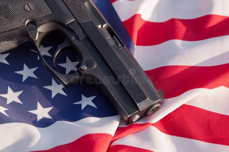 A Pistol on an American Flag Stock Photo - Image of background, sidearm ...