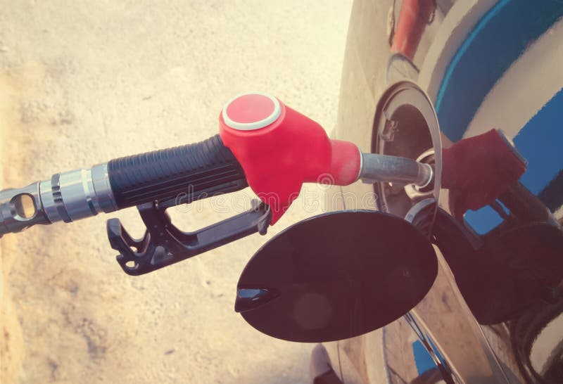 Pistol in the Fuel, Car on a Petrol Station Stock Image - Image of ...