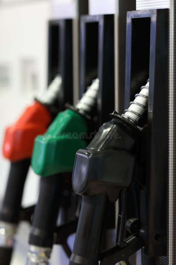 Pistol Fuel Dispenser at a Gas Station Stock Photo - Image of service ...