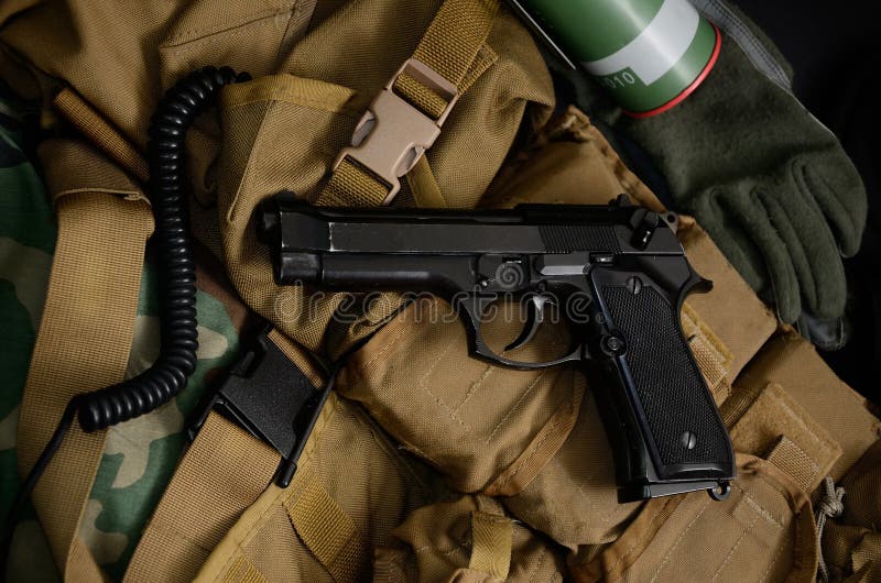 Pistol Gun with Military Equipment Stock Photo - Image of fire, attack ...