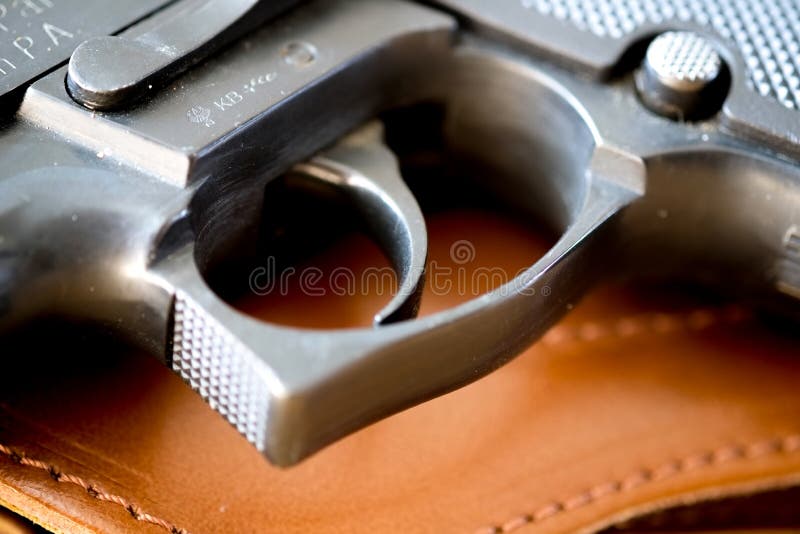Pistol or gun trigger stock photo. Image of metallic - 24124944