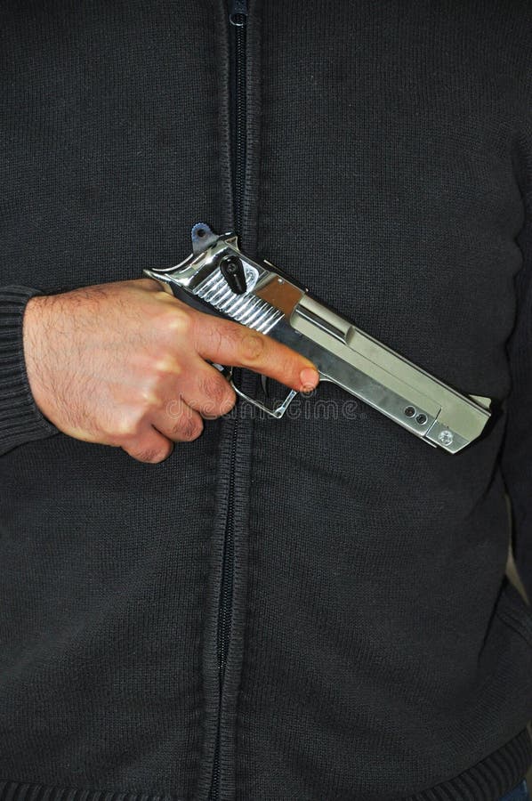 Pistol in hand stock image. Image of assault, hunting - 19457725