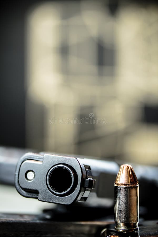 Pistol Handgun and Bullets stock image. Image of violence - 107119311