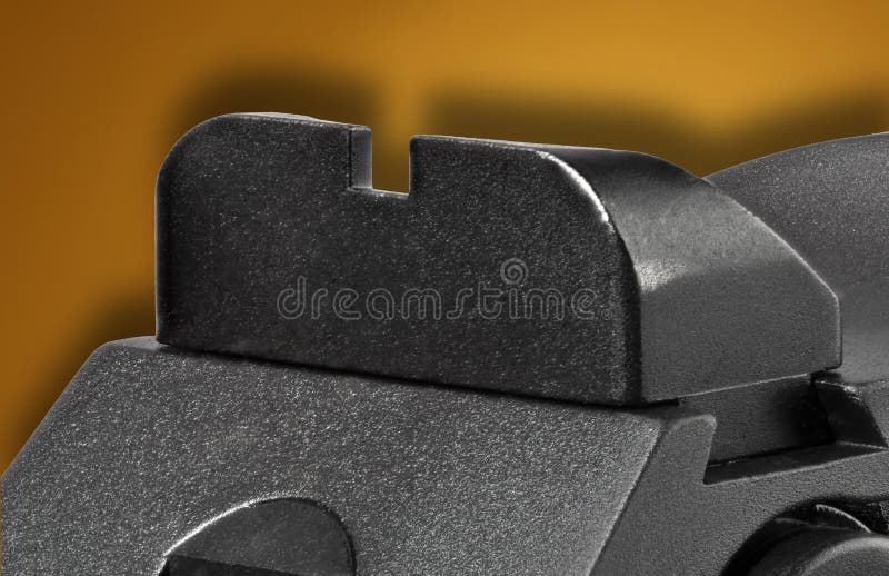 Rear Sight on a Pistol with Brown Background Stock Image - Image of ...