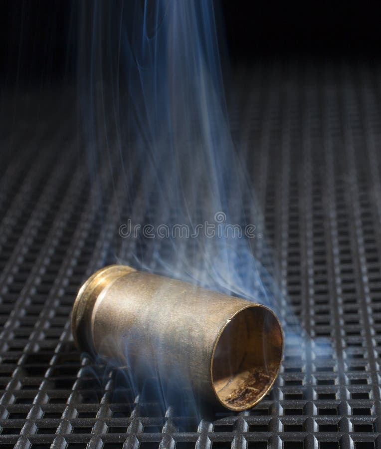 Pistol shell stock photo. Image of bronze, brass, grey - 69379440