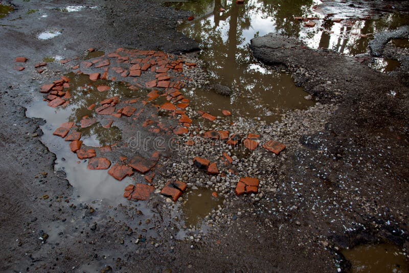 Pit on asphalt pavement stock photo. Image of driveway - 96716702