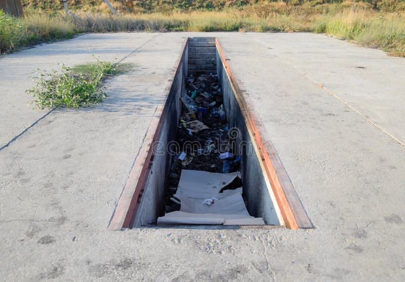Pit for Car Maintenance. Garbage in the Garage. Stock Photo - Image of ...