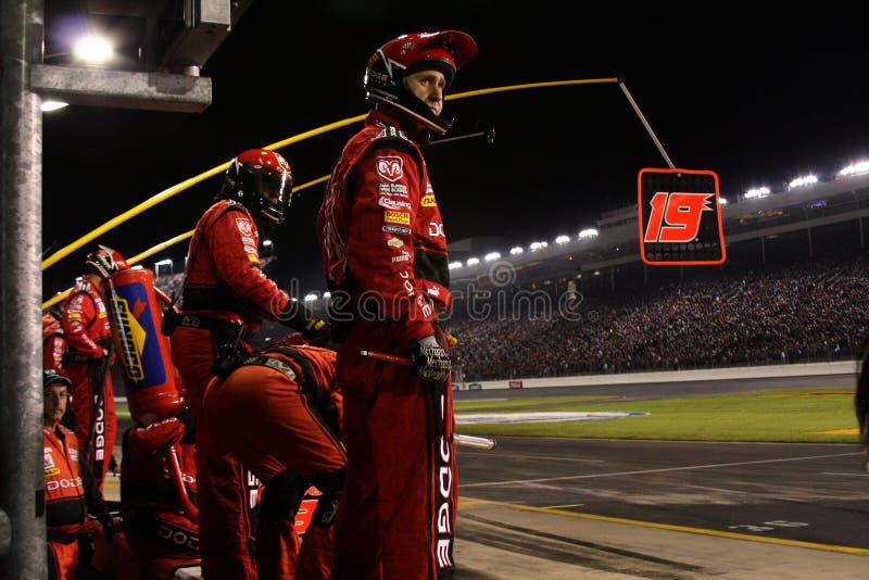 Pit Crew on the Wall editorial image. Image of garage - 4500530