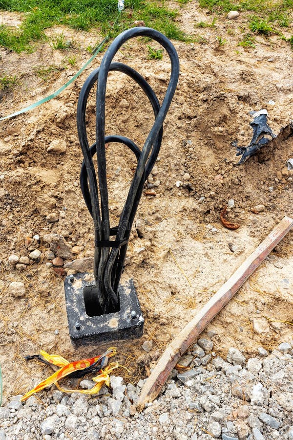 Electric Cables from a Pipe To the Ground Stock Image - Image of ...
