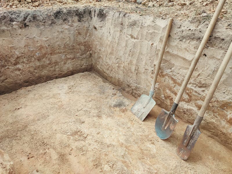 Pit in the Ground. Digging a Pit. the Shovels in the Pit. Earthworks ...
