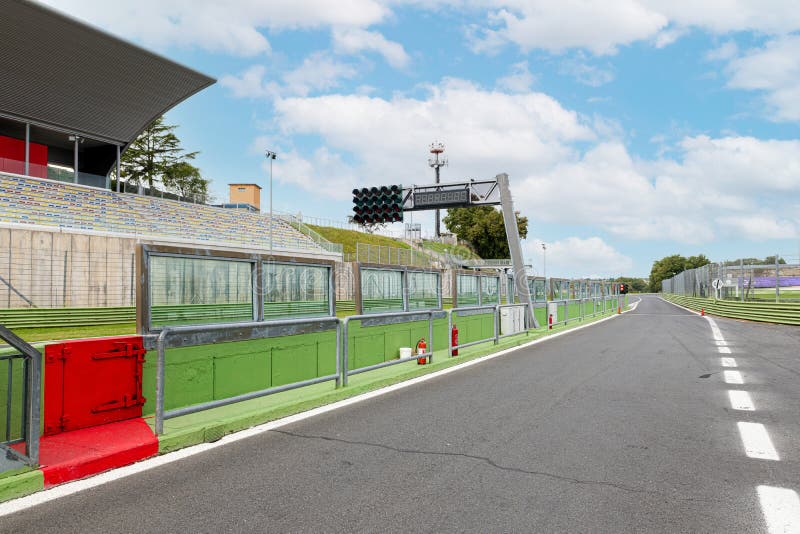 Pit Lane Exit in Motor Sport Asphalt Circuit Barrier Wall and Red Light ...