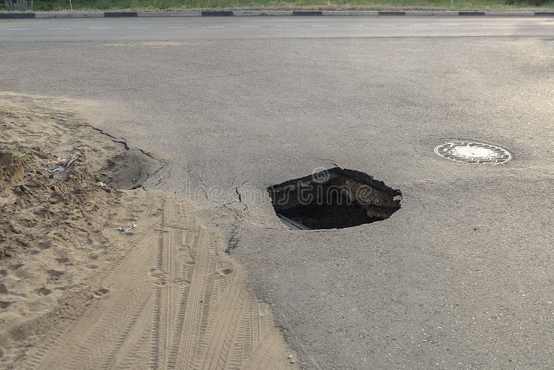 Pit road stock photo. Image of cone, broken, avenue, country - 66838378