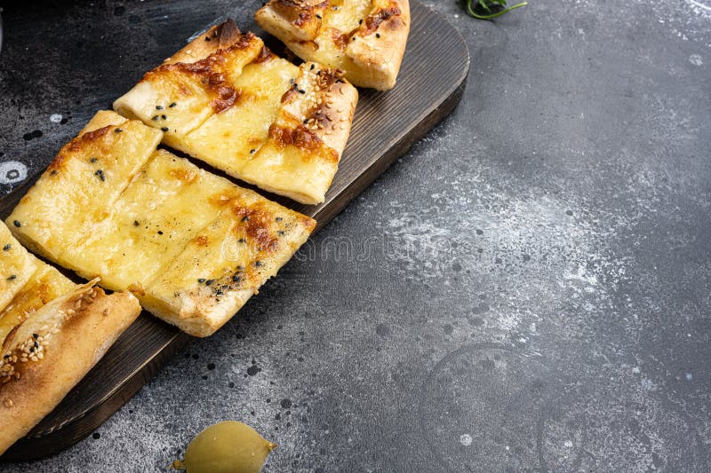 Pita with Sujuk and Kashar Cheese, on Black Dark Stone Table Background ...