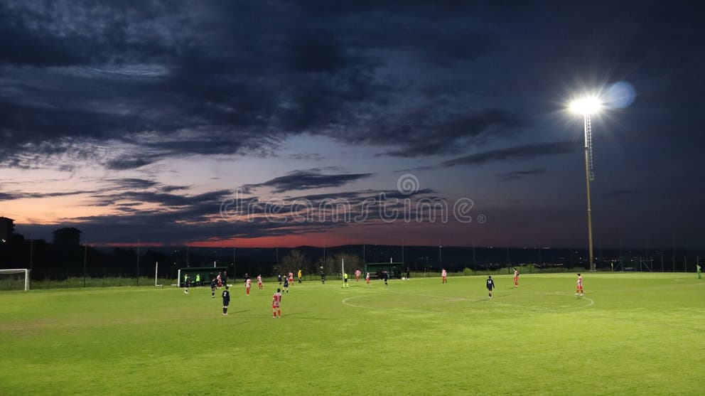 Pitch photo in the sunset stock image. Image of score - 390361167