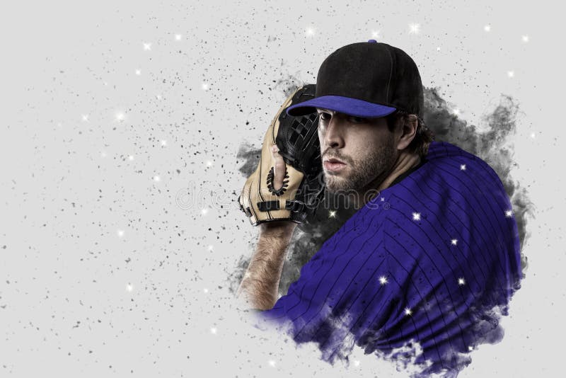 Baseball Pitcher, in Blue Uniform, Preparing To Throw Ball during ...