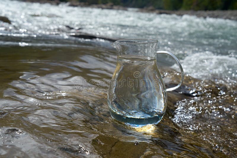 Pitcher of Clean River Water Stock Image - Image of micellar, creek ...