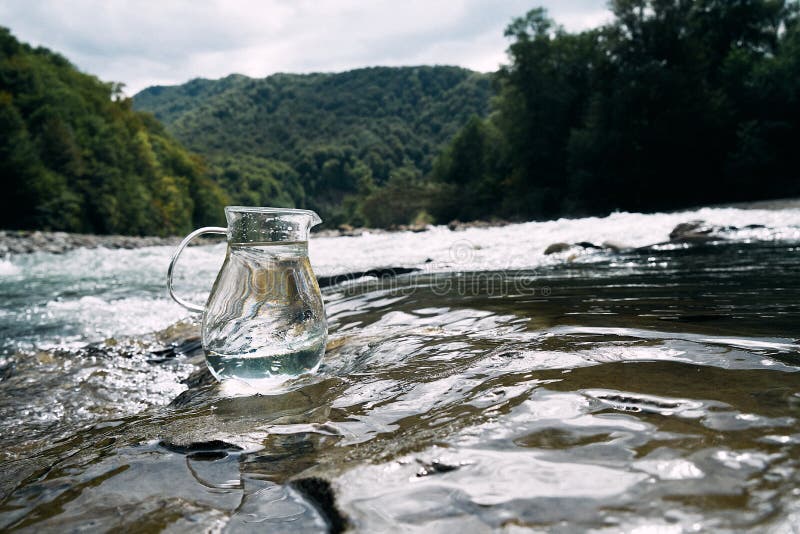 Pitcher of Clean River Water Stock Image - Image of ecologically ...
