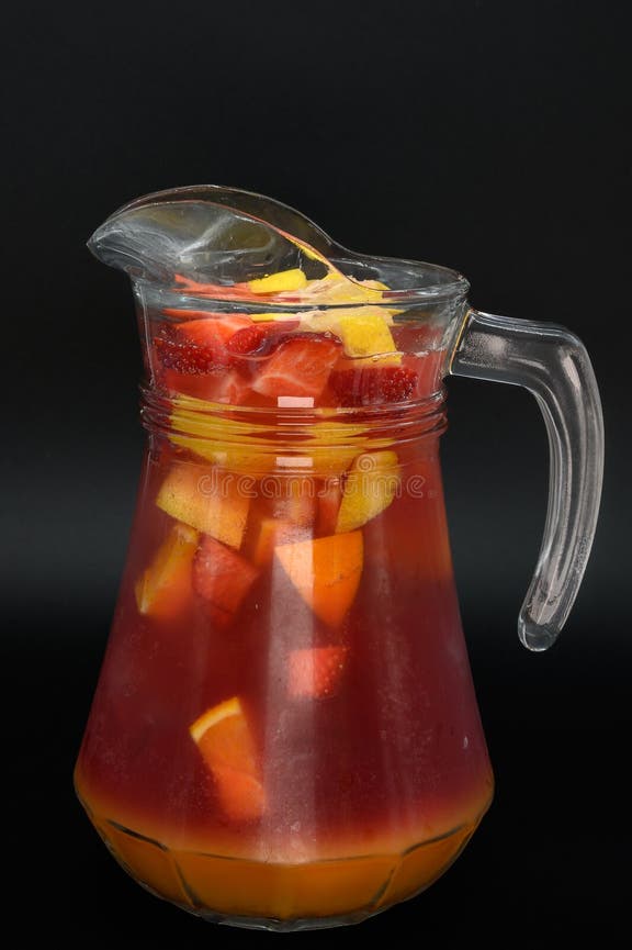A Pitcher of Fruit Punch is Sitting on a Table Stock Photo - Image of ...