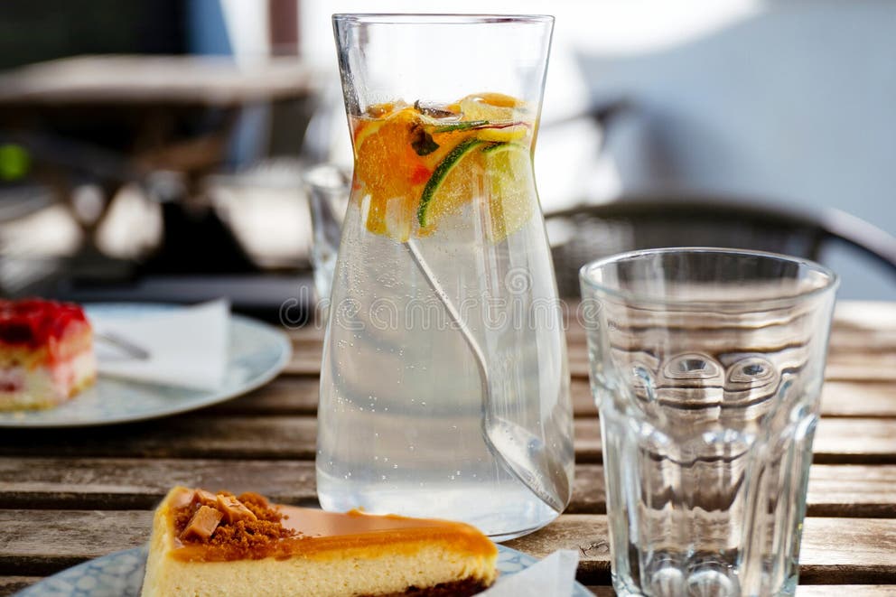 Pitcher with Fruit Water, Glass and Caramel Cake Stock Photo - Image of ...