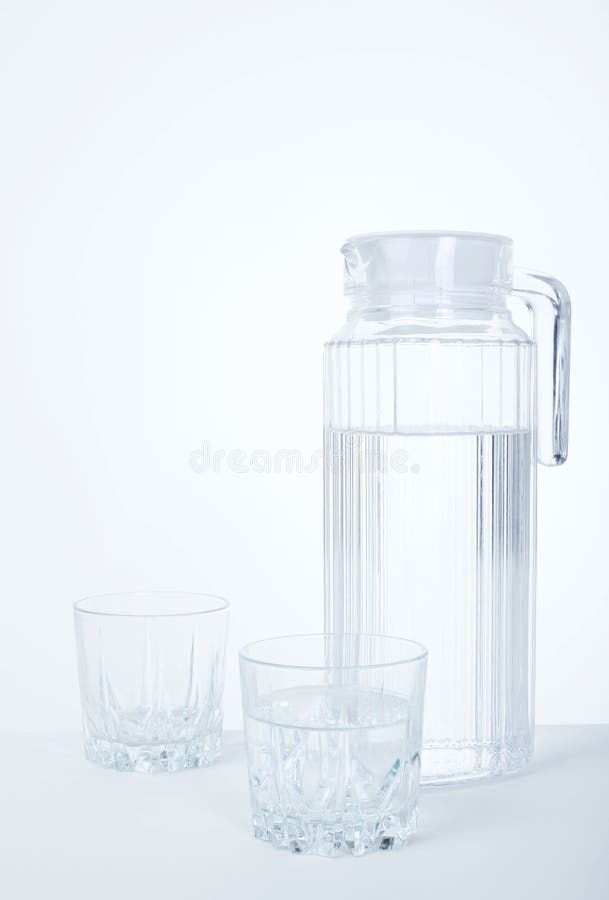 Pitcher and Glass with Ice Cubes of Mineral Water Stock Image - Image ...