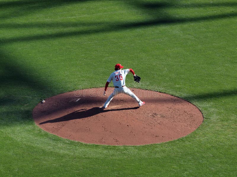 Pitcher Steps Forward To Throw Pitch from Mound Editorial Photography ...