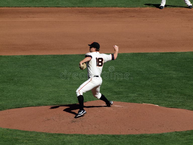 Pitcher Steps Forward To Throw Pitch from Mound Editorial Stock Photo ...