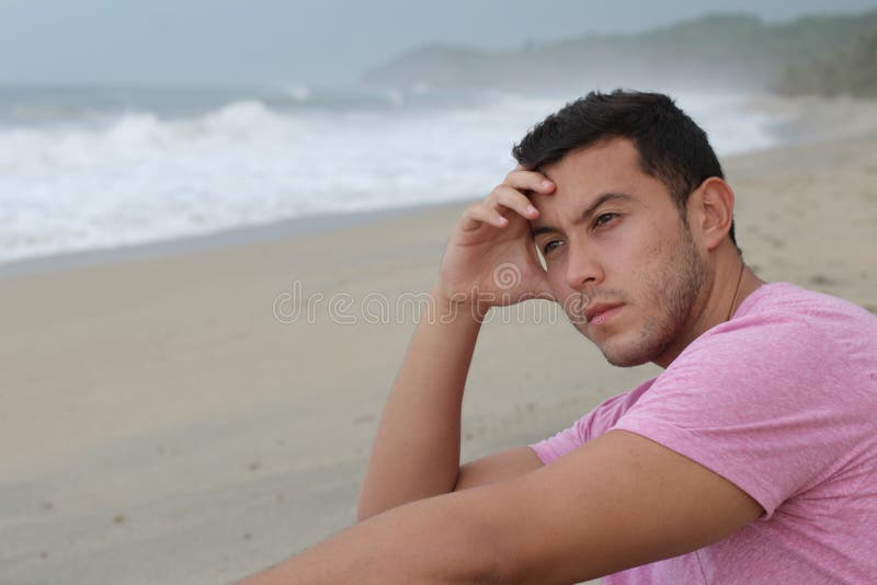 Pitiful Young Man at the Beach Stock Photo - Image of angry, disorder ...
