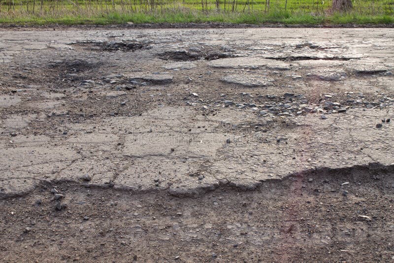 Pits and Potholes on Asphalt Road Stock Photo - Image of rough ...
