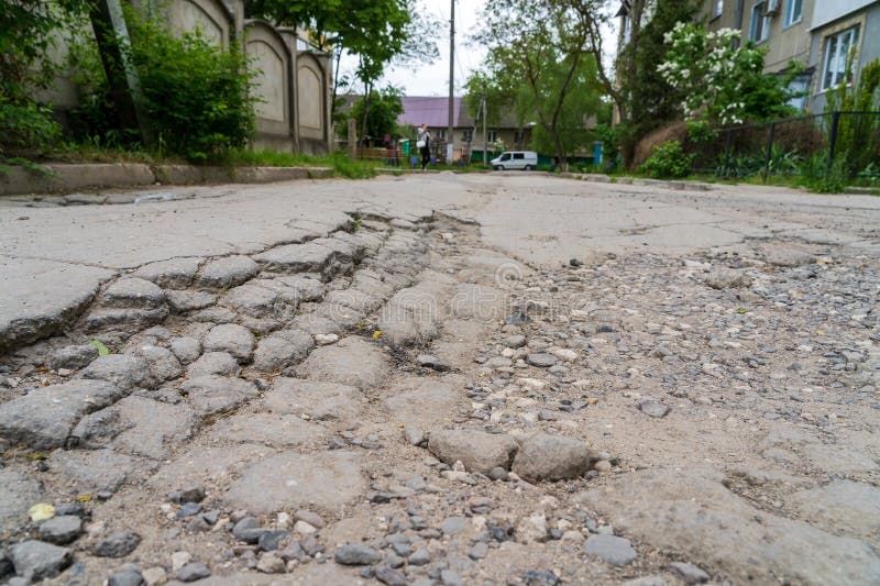 Pits on the Road and Destroyed Asphalt. Background with Copy Space ...