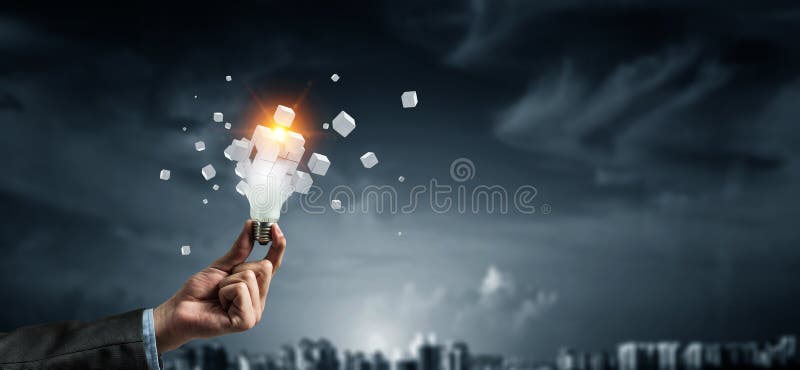 Pixelated Light Bulb. Development Concept. Mixed Media Stock Photo ...