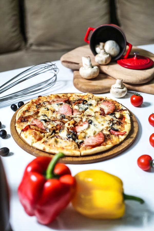 Pizza with Assorted Toppings on Table Stock Photo - Image of savory ...