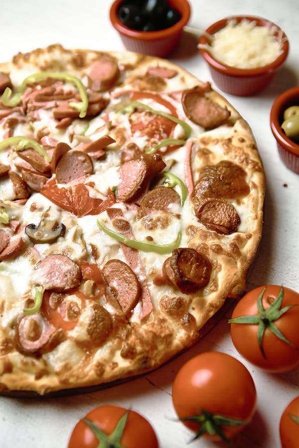 Pizza with Assorted Toppings on Table Stock Photo - Image of ...