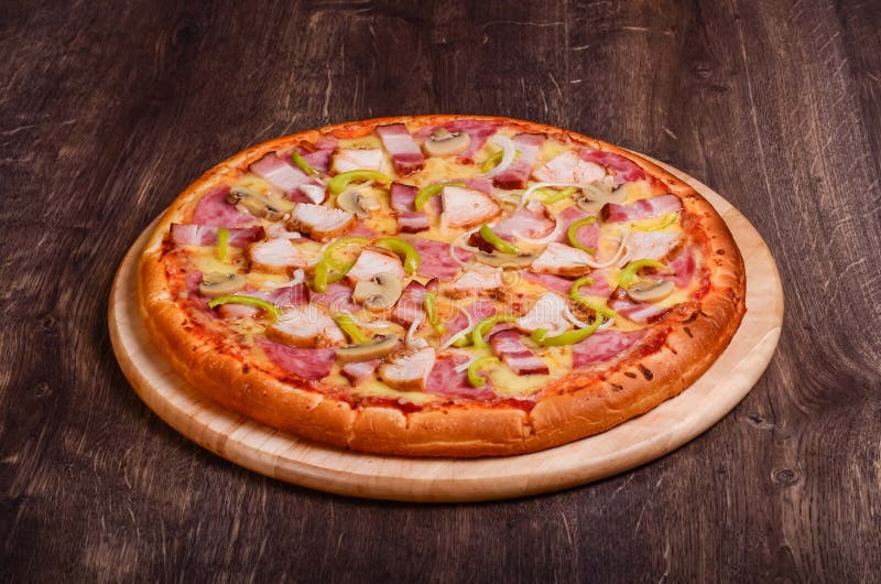 Pizza with Bacon, Ham, Chicken and Champignons Stock Image - Image of ...