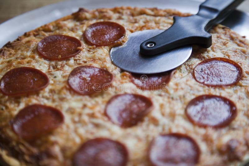 Baked Pepperoni and Cheese Thin Crust Pizza Stock Photo - Image of cook ...