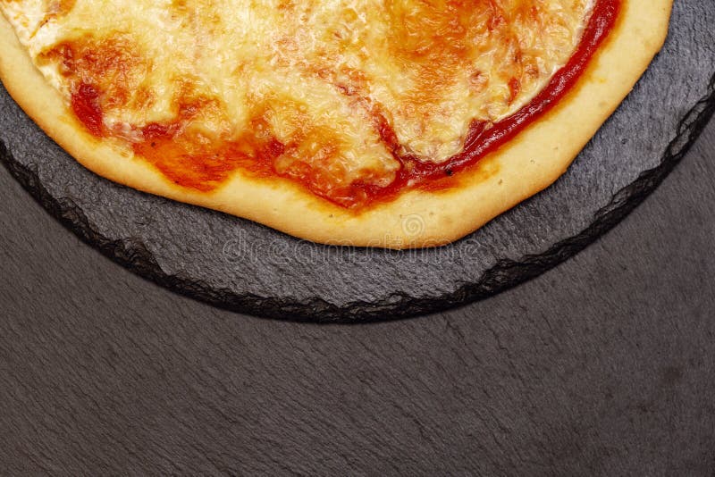 Pizza on a Black Table. Side View Stock Image - Image of restaurant ...