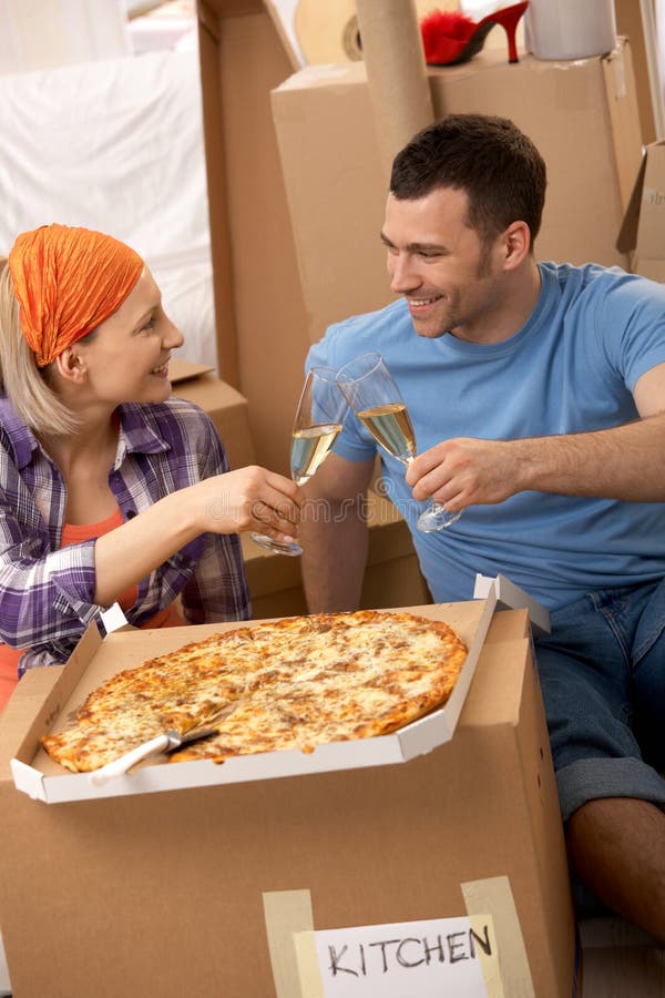 Pizza Break at Moving House Stock Photo - Image of celebrating ...