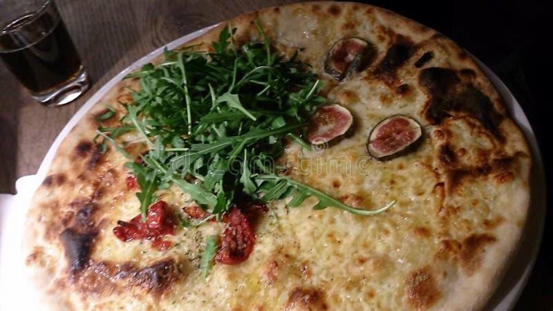 A Pizza with Cheese and Dandelion Stock Image - Image of delicious ...