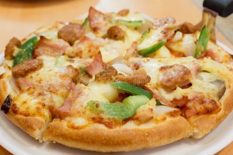 Pizza with Ham and Bacon stock image. Image of cooked - 70926947
