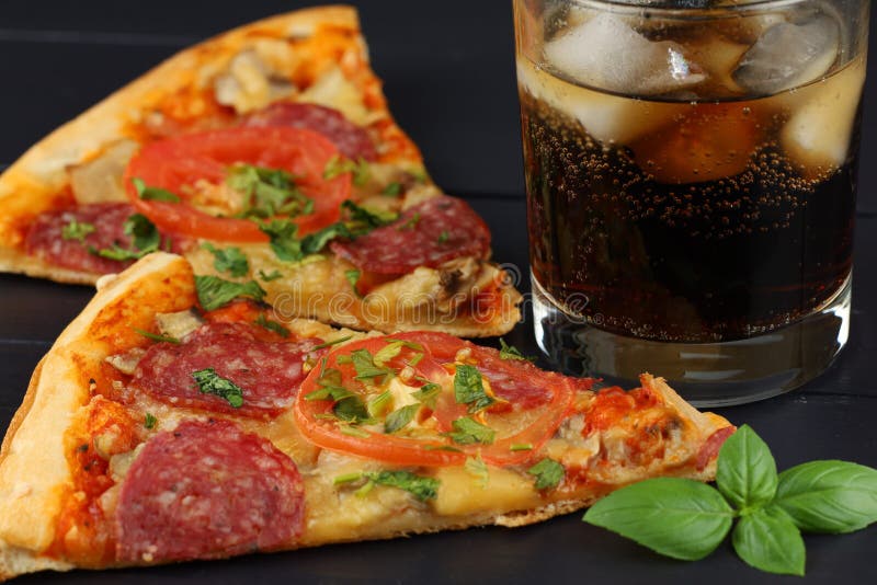 Pizza and Cola with Ice. Pizza with Cola on the Table in the Restaurant ...