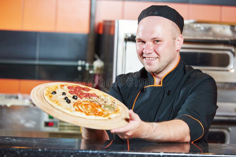 Pizza cook man stock photo. Image of oven, occupation - 60729820