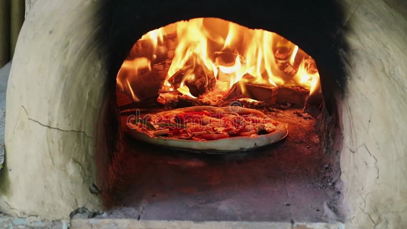 Pizza Cooking in a Brick Oven Pizza Furnace Stock Footage - Video of ...