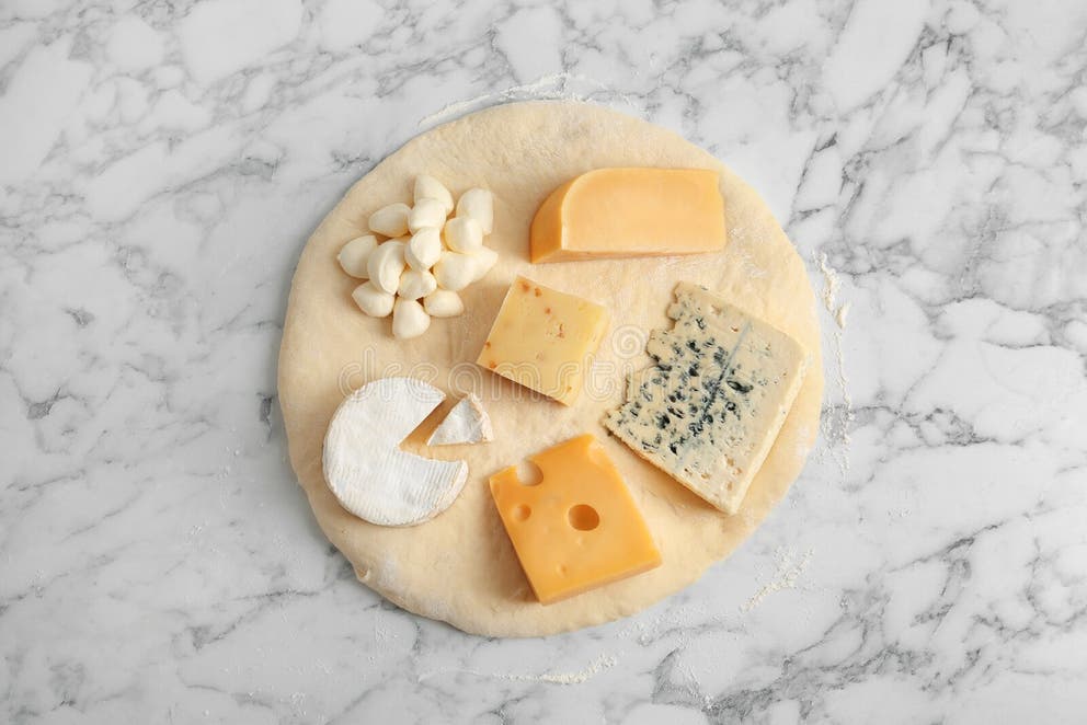Pizza Crust with Fresh Ingredients on Marble Table Stock Photo - Image ...