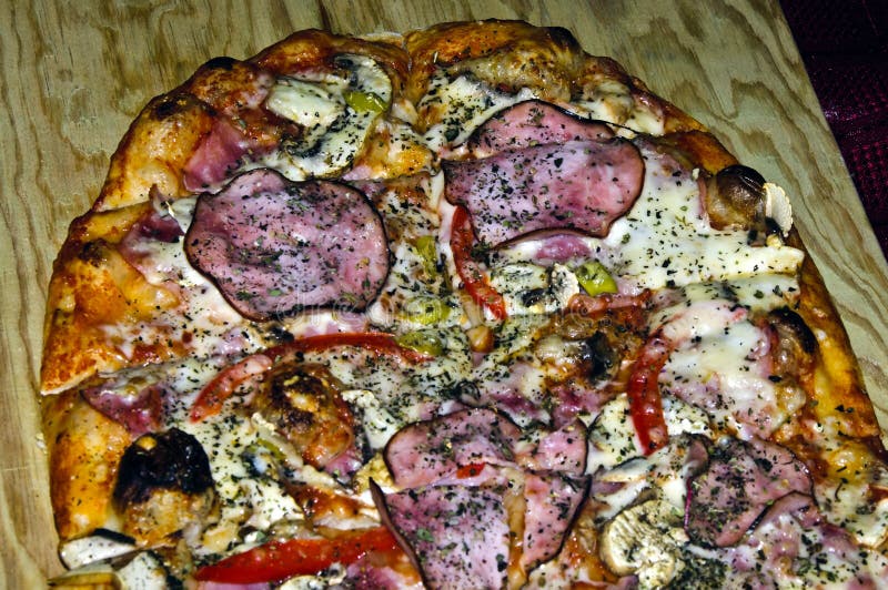 Pizza cut into chunks stock image. Image of restaurant - 21340257