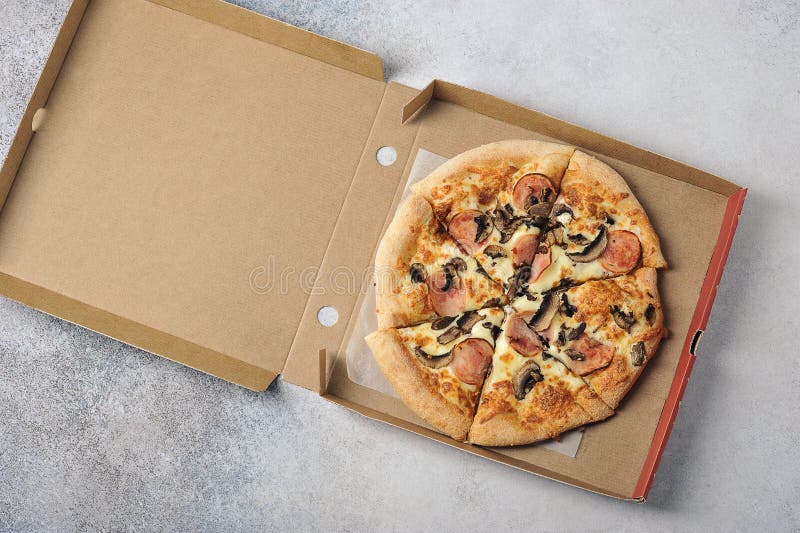 Pizza Cut into Pieces in a Cardboard Box Stock Photo - Image of piece ...
