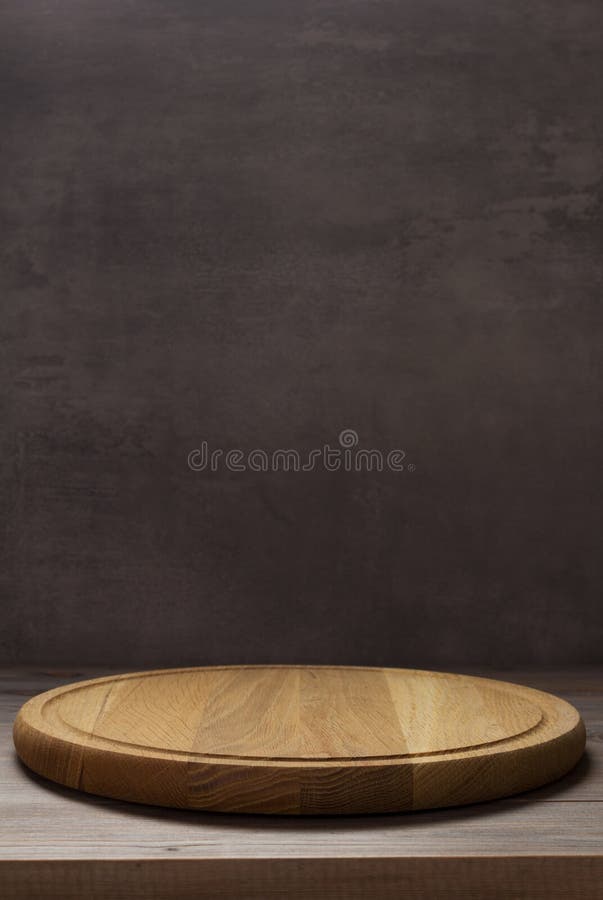 Pizza Cutting Board at Rustic Wooden Table Stock Photo - Image of board ...